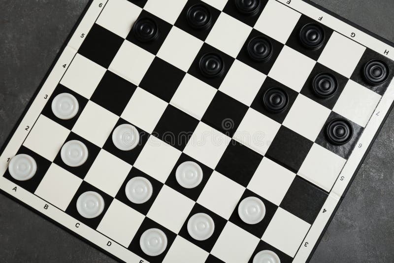 Checkerboard with Game Pieces on Grey Table, Top View Stock Image ...
