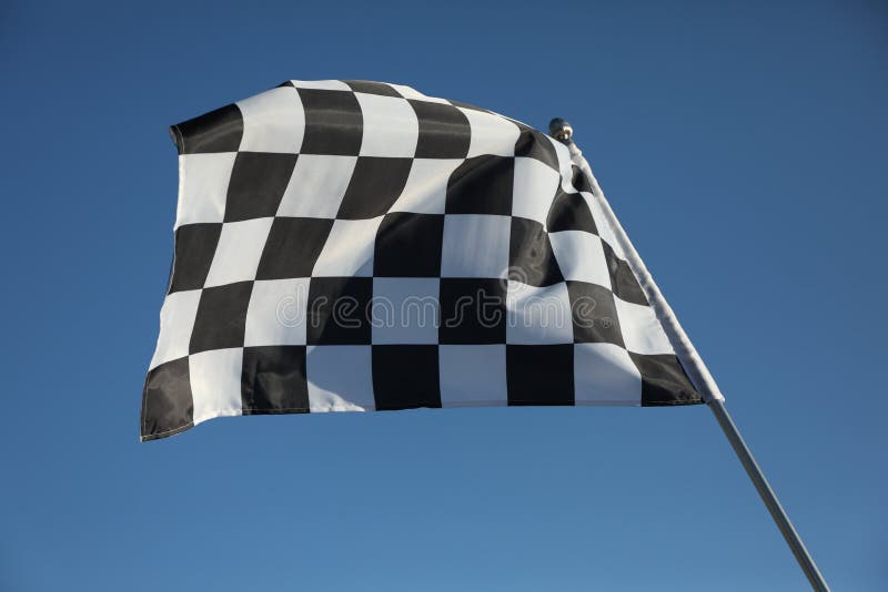 Checkered Finish Flag on Light Blue Background Stock Image - Image of ...
