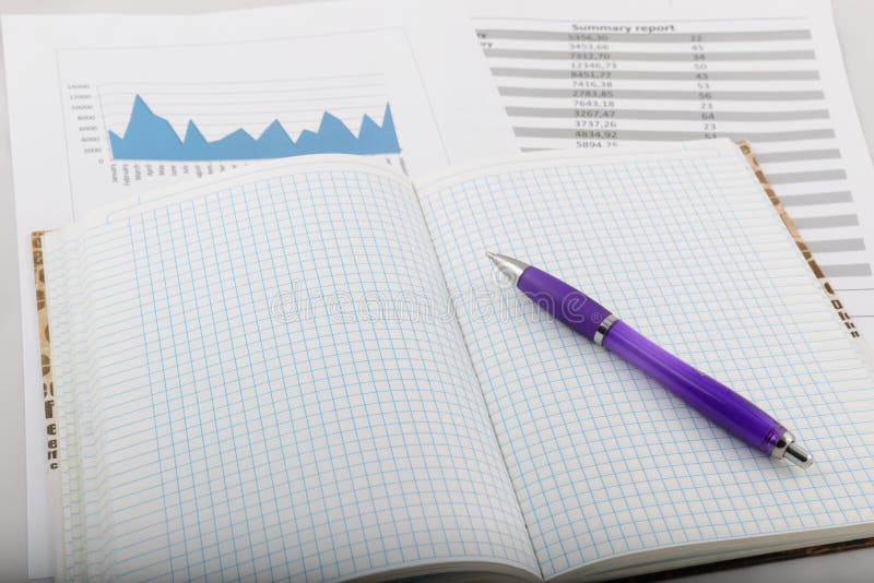 Checkered Notebook, a Pen, and Sheets of Tables and Graphs Stock Image ...