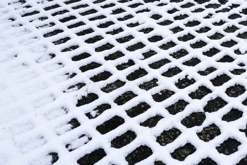 A Checkered Outline Snowy Pattern on Dark Cobblestones, Perspective ...