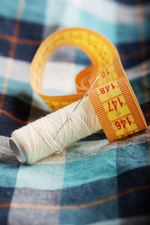 Checkered Shirt Thread Needle and Measure Tape Stock Photo - Image of ...