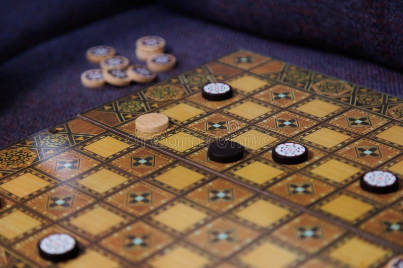 Checkers Board, the Game Continues, Several Checkers Lie To the Side ...