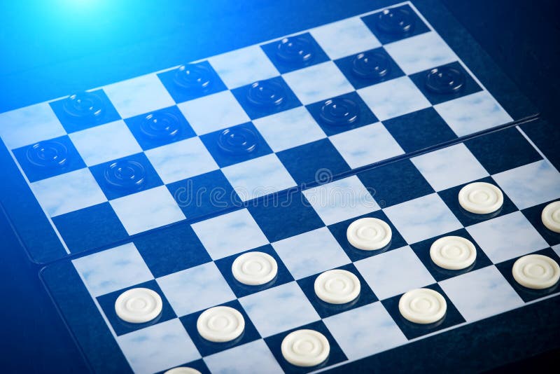 Checkers Board with Checkers Illuminated with Bright Blue Light Stock ...