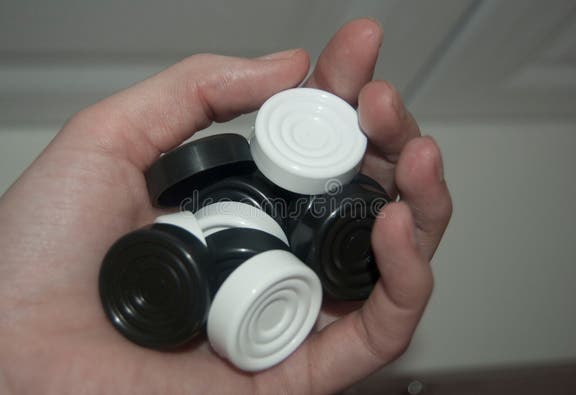 Checkers in hand stock photo. Image of game, checkers - 147936190