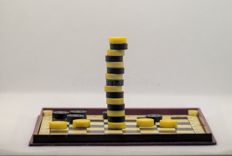 Checkers Stacked on a Game Board Stock Photo - Image of stack, activity ...