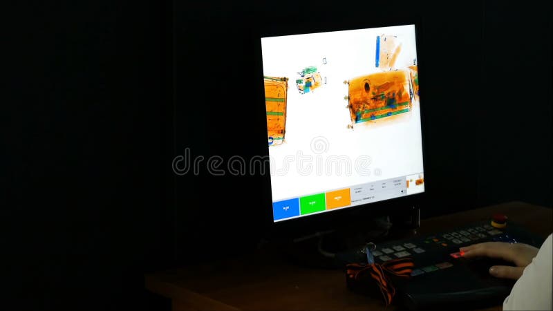 Checking Airport Security at the Gate Using an X-ray Scanner Stock ...