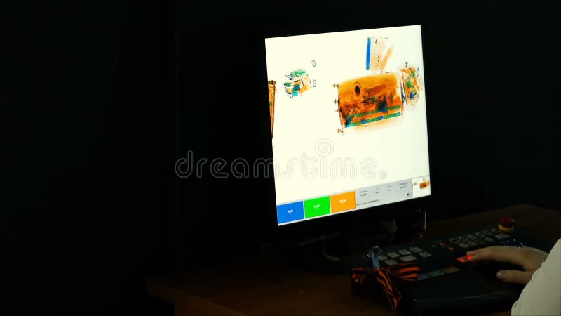 Checking Airport Security at the Gate Using an X-ray Scanner Stock ...