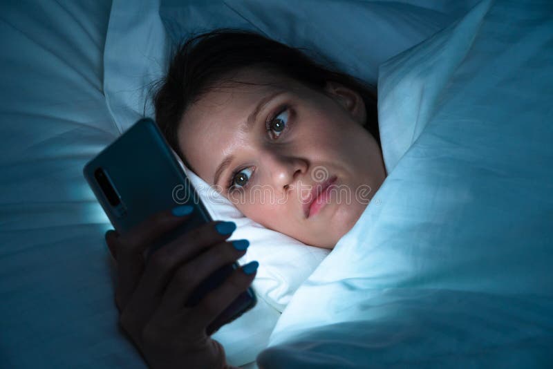 Woman Checking Apps before Sleeping, Use Smartphone at Night Stock ...