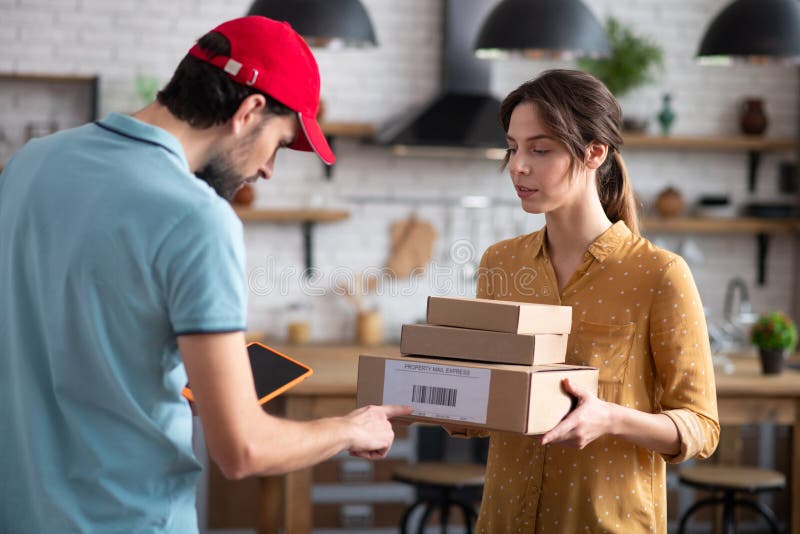 Delivery Person Checking Barcode on the Boxes Stock Image - Image of ...