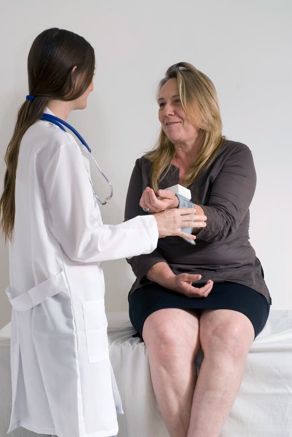 Blood Pressure Check-up - Vertical Stock Photo - Image of serene ...