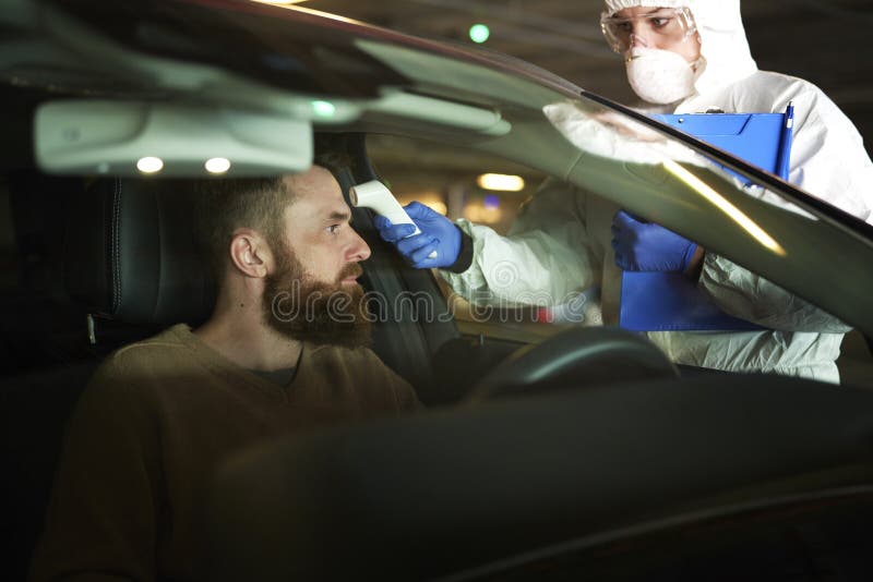 Checking Body Temperature for COVID-19 Stock Photo - Image of body ...