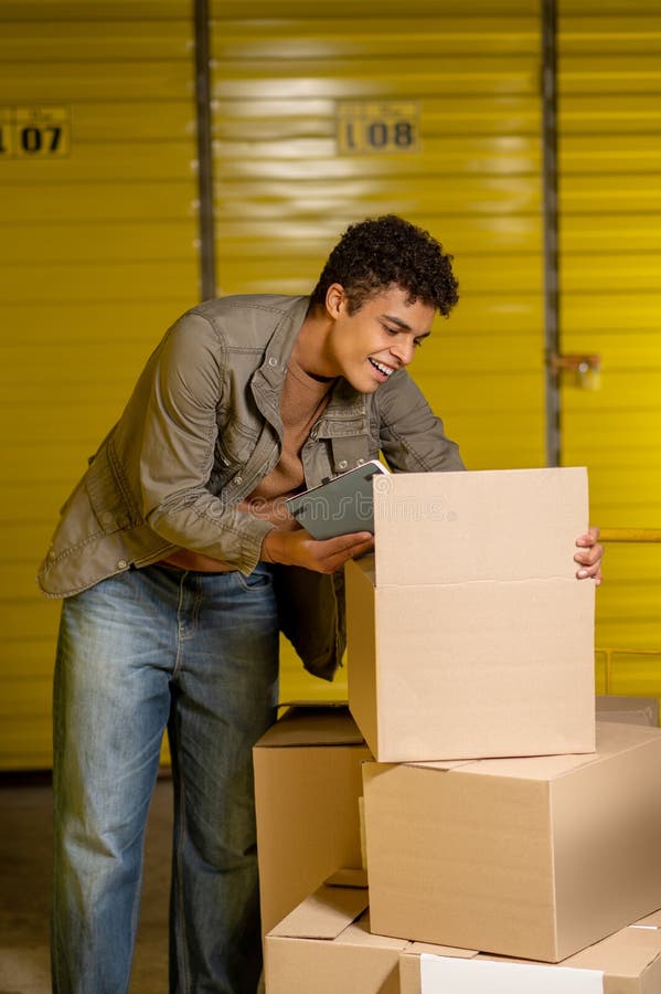 Service Man Checking the Boxes Aand Looking Excited Stock Photo - Image ...