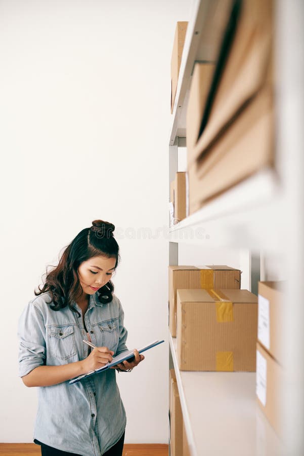 Checking Boxes in Warehouse Stock Photo - Image of asian, female: 127950666