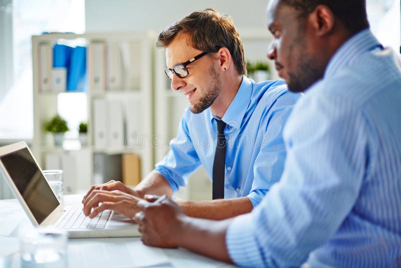 Strict Female Team Leader Checking Papers with Employee, Brainstorming ...