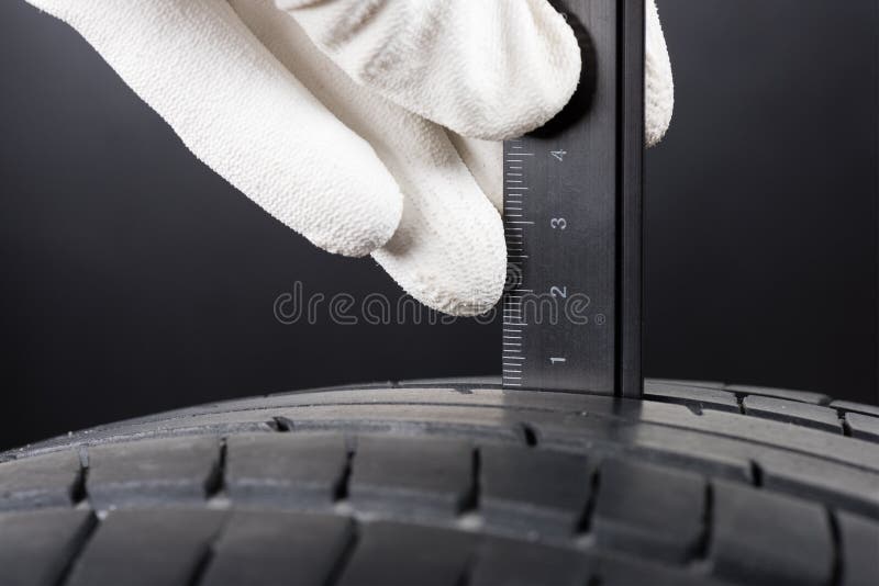 Checking car tire stock image. Image of automobile, tyre - 187176467