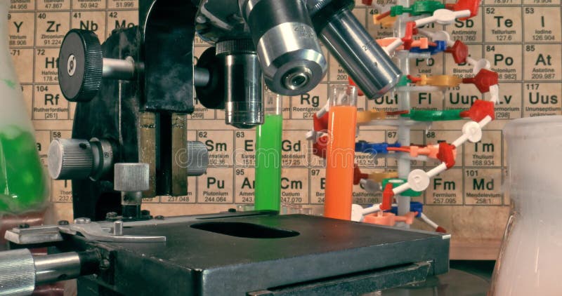 Checking Chemical Formula in Academic Laboratory with Microscope. Stock ...