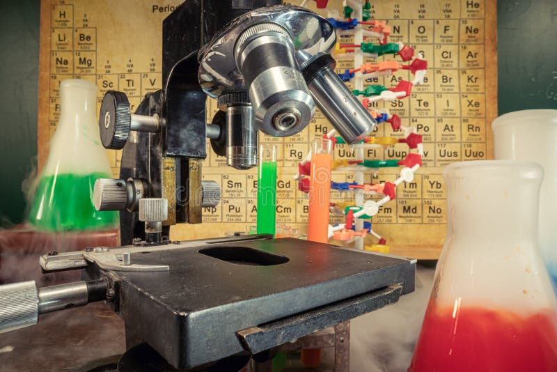 Checking Chemical Formula in University Laboratory with Beakers Stock ...