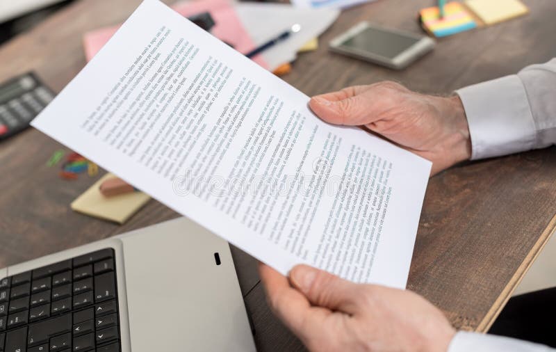 Checking a document stock photo. Image of contract, office - 89779640