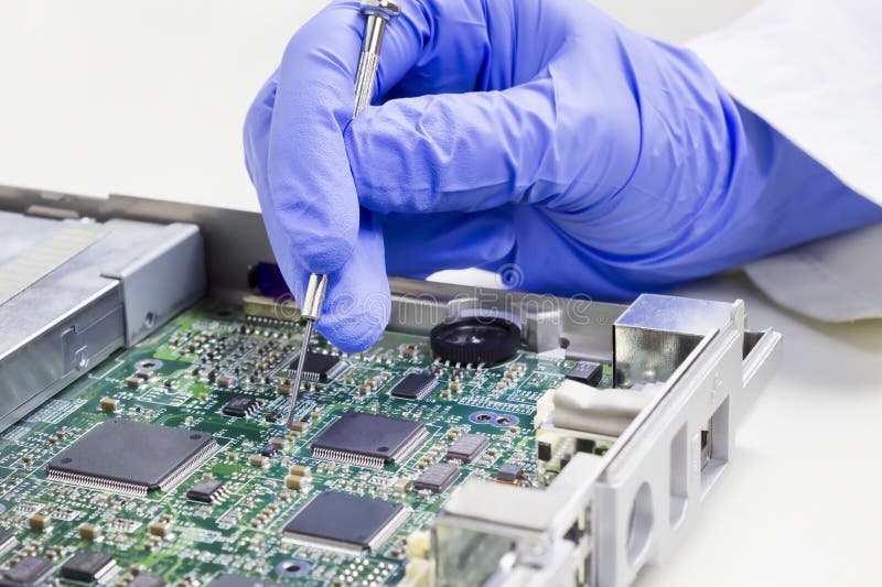 Checking electronics stock image. Image of computer, hand - 51781449