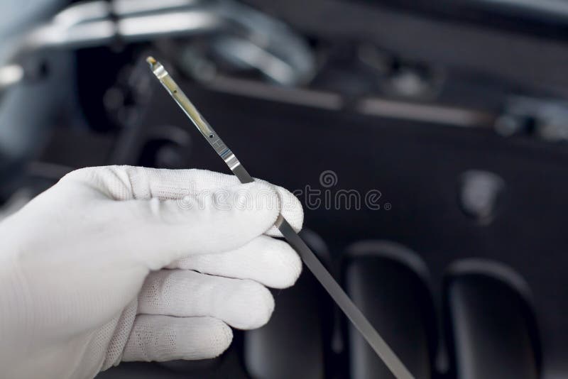 Check the engine oil stock image. Image of mechanic, follow - 30097007