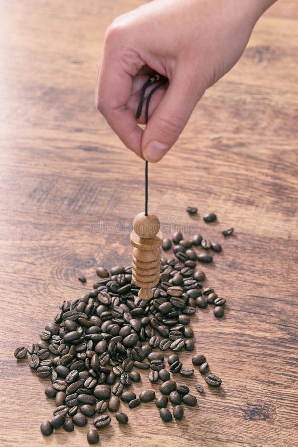 Checking Food with Pendulum Stock Photo - Image of food, alternative ...