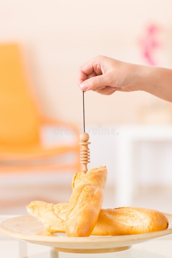 Checking Food with Pendulum Stock Photo - Image of gold, food: 41645834