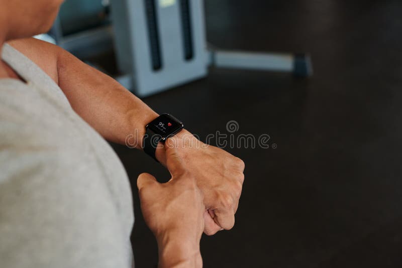 Checking heart rate stock image. Image of closeup, training - 97347831