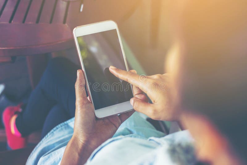 Businesswoman Sending Message with Smartphone in Office Stock Photo ...