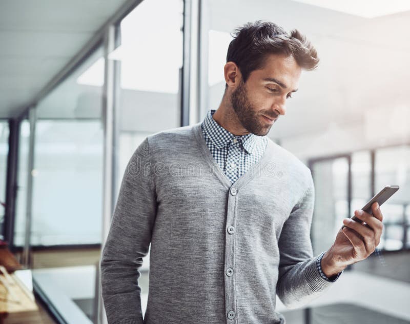 Checking His Calendar. a Handsome Young Businessman Looking at His ...