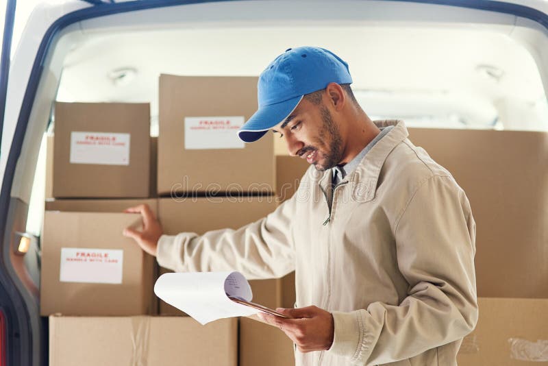 Checking His Orders Handsome Young Delivery Man Day Stock Photos - Free ...