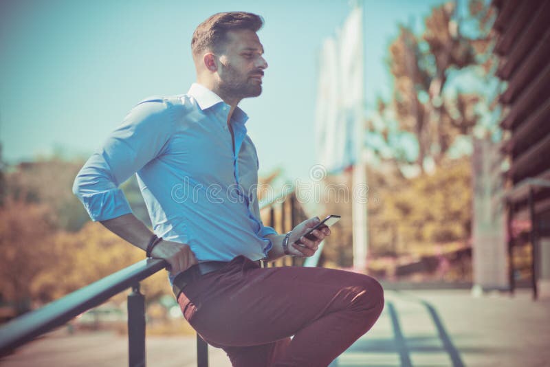 Checking his schedule stock image. Image of fashion - 150297189