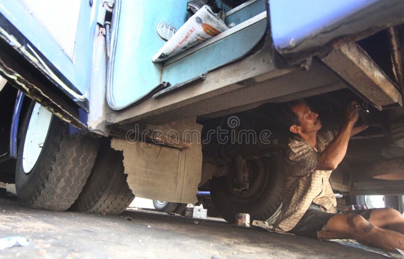 Checking the machine editorial photography. Image of solo - 32528672