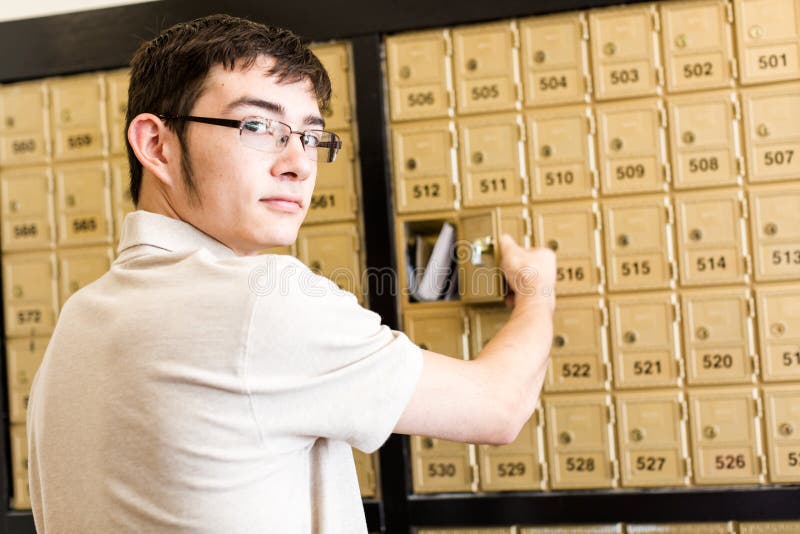 Checking mail stock image. Image of adolescent, college - 41637129