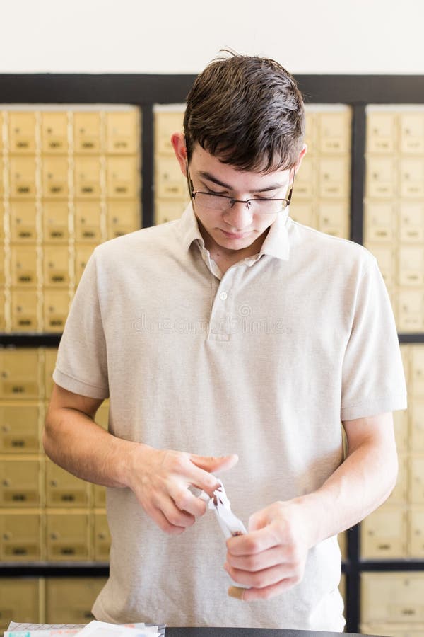 Checking mail stock image. Image of college, male, metal - 41637453
