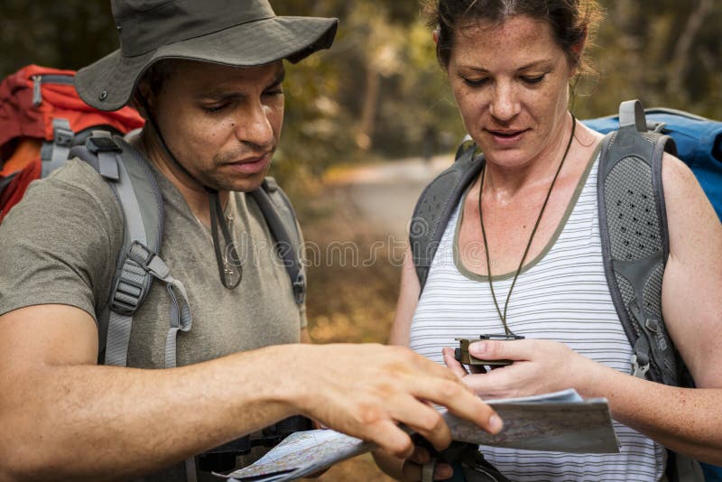 Checking on the Map for Directions Stock Image - Image of finding ...