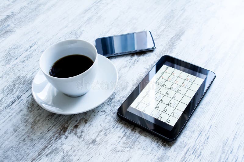 Checking Monthly Activities in the Calendar in the Tablet Stock Photo ...