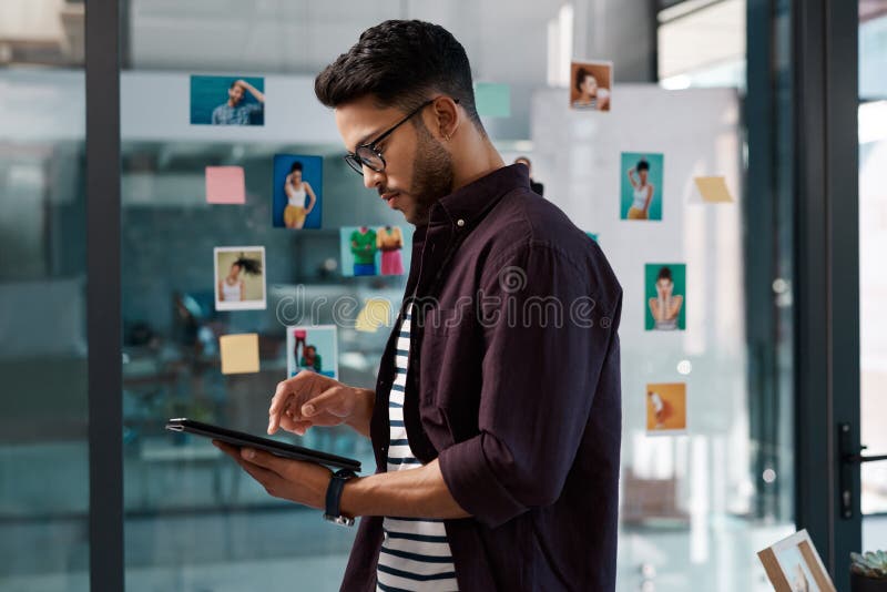 Checking My Schedule for the Day. a Handsome Young Businessman Standing ...