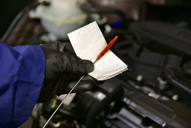 Checking the Oil Level in the Car Engine Stock Photo - Image of ...