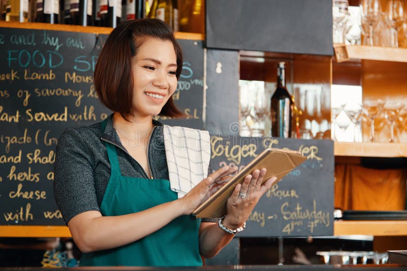 Checking Orders on Tablet Computer Stock Image - Image of reading ...