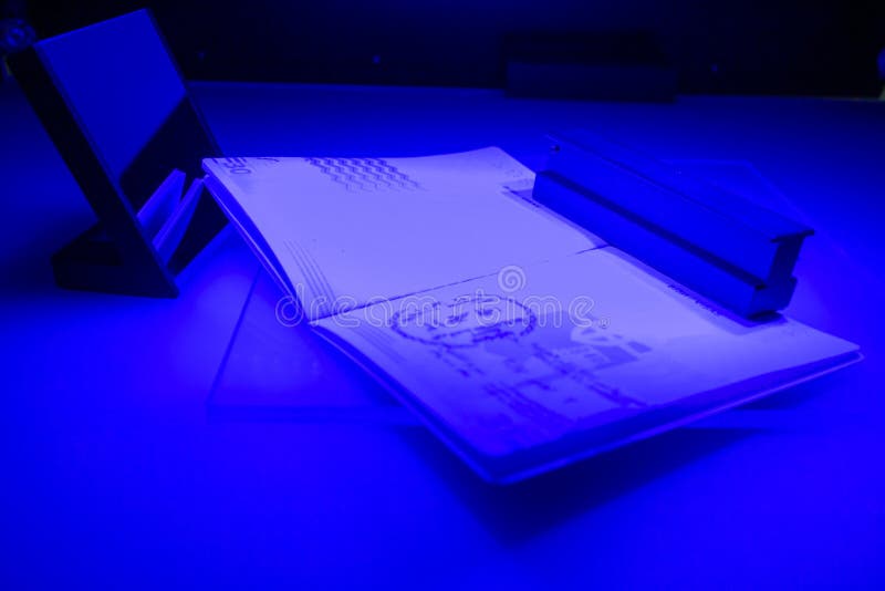 Checking the Passport for Fraud in UV and Another Light, Detection of ...