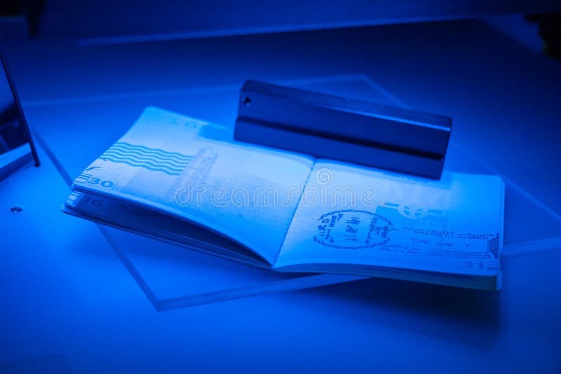 Checking the Passport for Fraud in UV and Another Light, Detection of ...