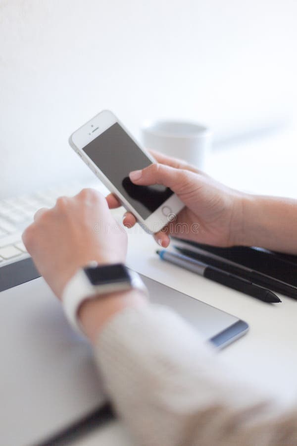 Checking phone stock image. Image of sitting, watch, student - 73990603