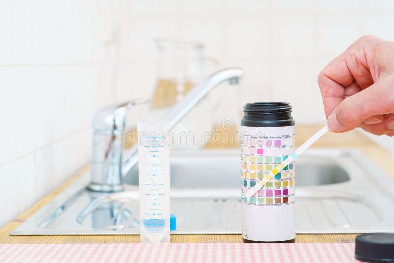 Checking the Quality of Tap Water with a Water Test Kit Stock Image ...