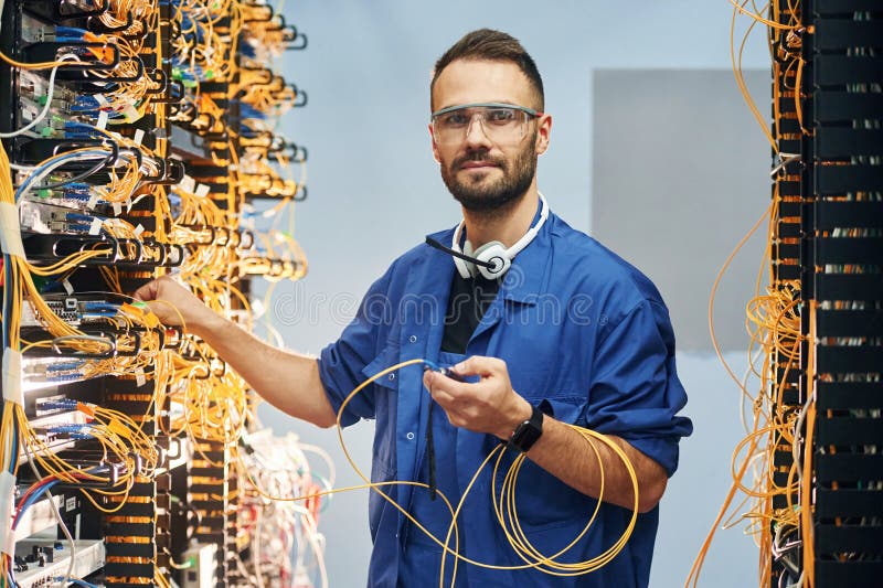 Checking Signal by Device. Young Man is Working with Internet Equipment ...
