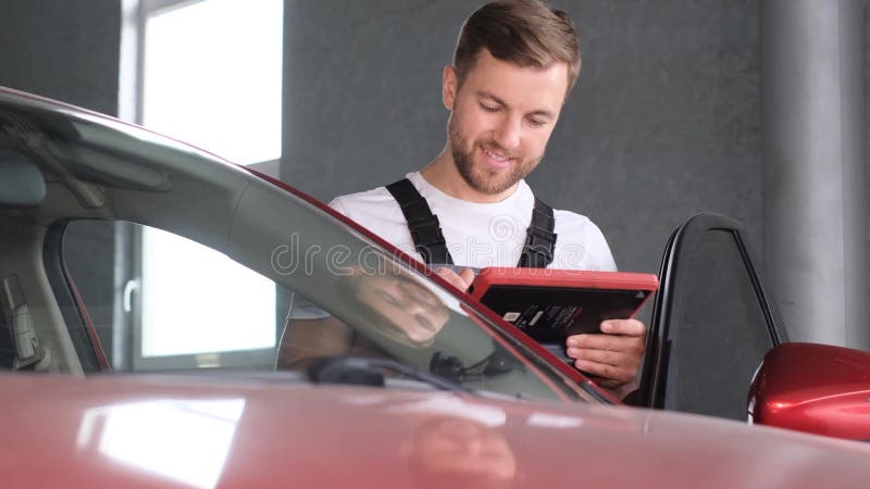 Checking the Technical Condition of the Car Using a Tablet. Stock Image ...