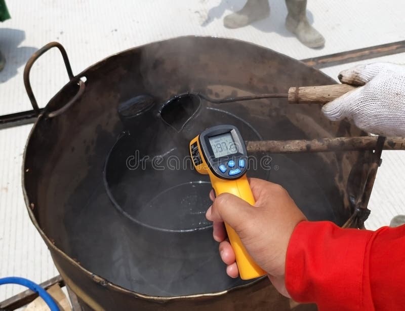 Checking the Temperature on Asphalt Heating Stock Photo - Image of food ...