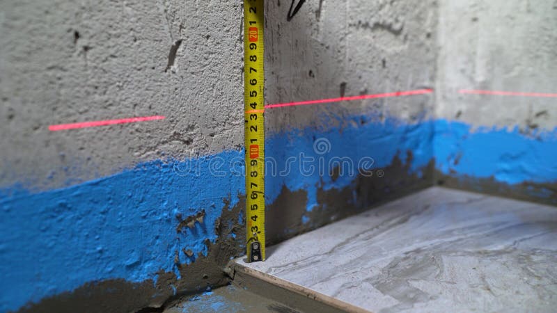 Checking the Tiles in the Bathroom. Quality Control when Laying Ceramic ...