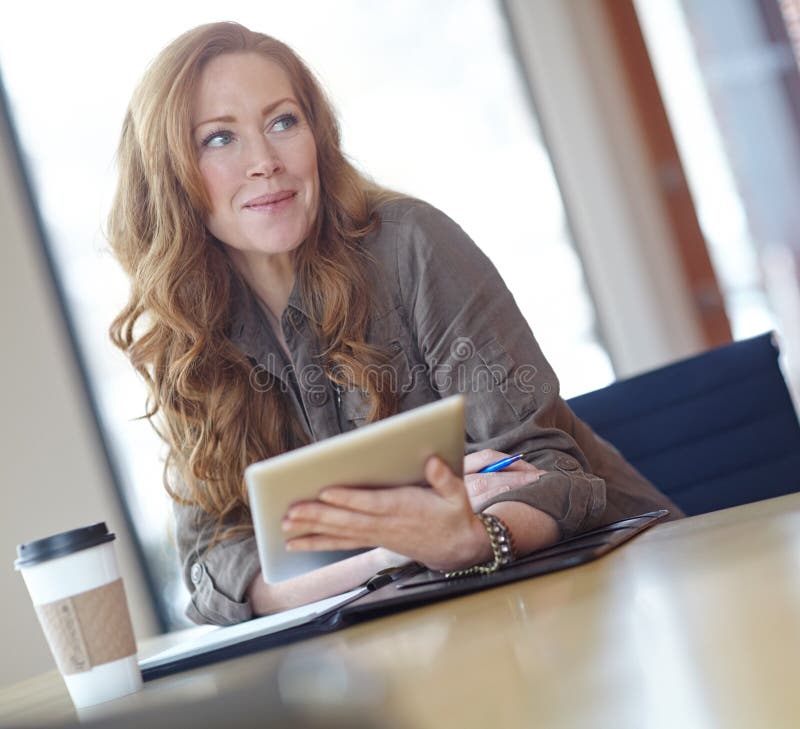 Checking Up on Emails during Her Coffee Break. a Beautiful Young Woman ...