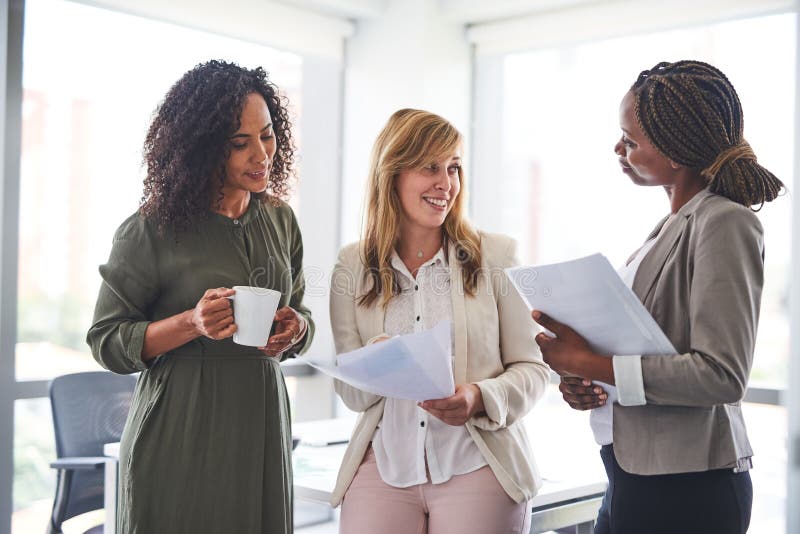 Checking Up on Paperwork Making Sure Its Correct. a Group of ...