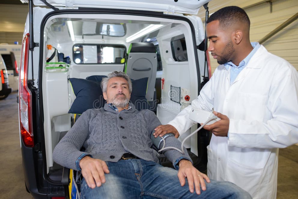 Checking Victim`s Pulse Rate Stock Photo - Image of technician ...